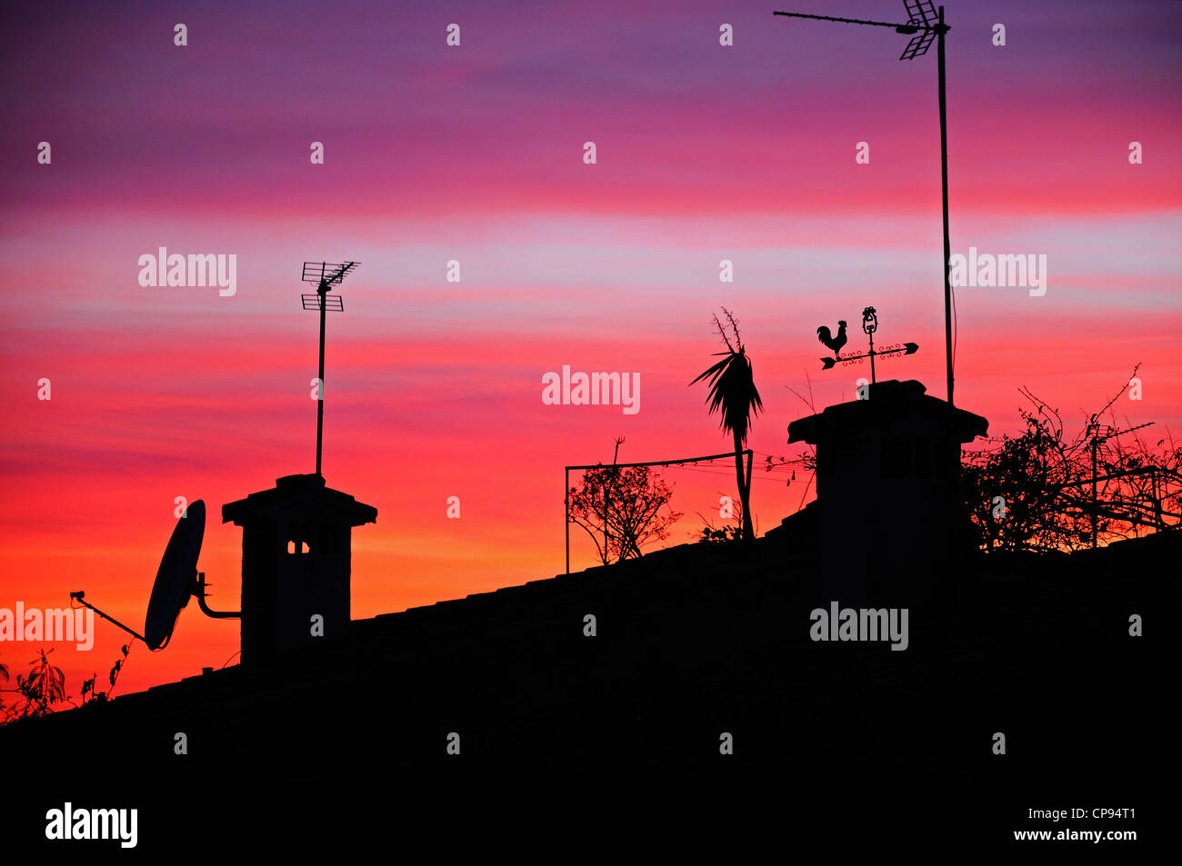 Mediterranean sunset over house rooftops, Costa del Sol, Malaga ...