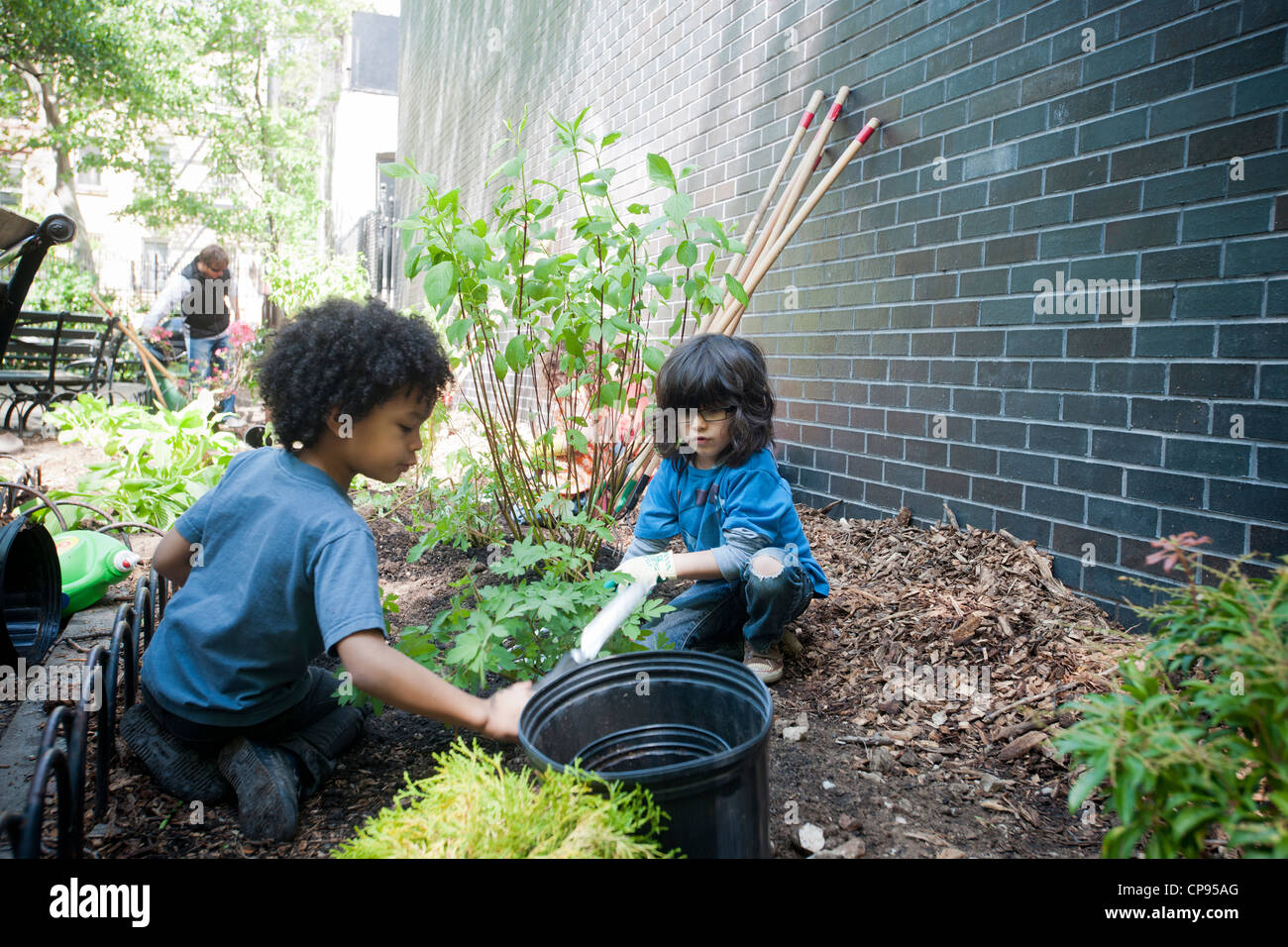 Diverse children tree planting hi-res stock photography and images - Alamy