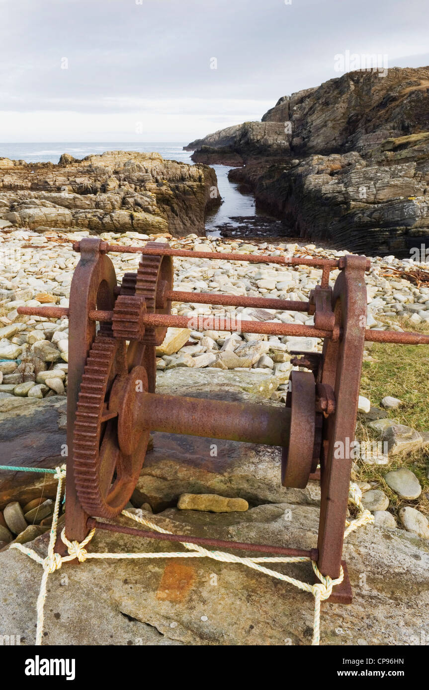 Old pulley for winching boats out of the water at Portvasgo, a small ...