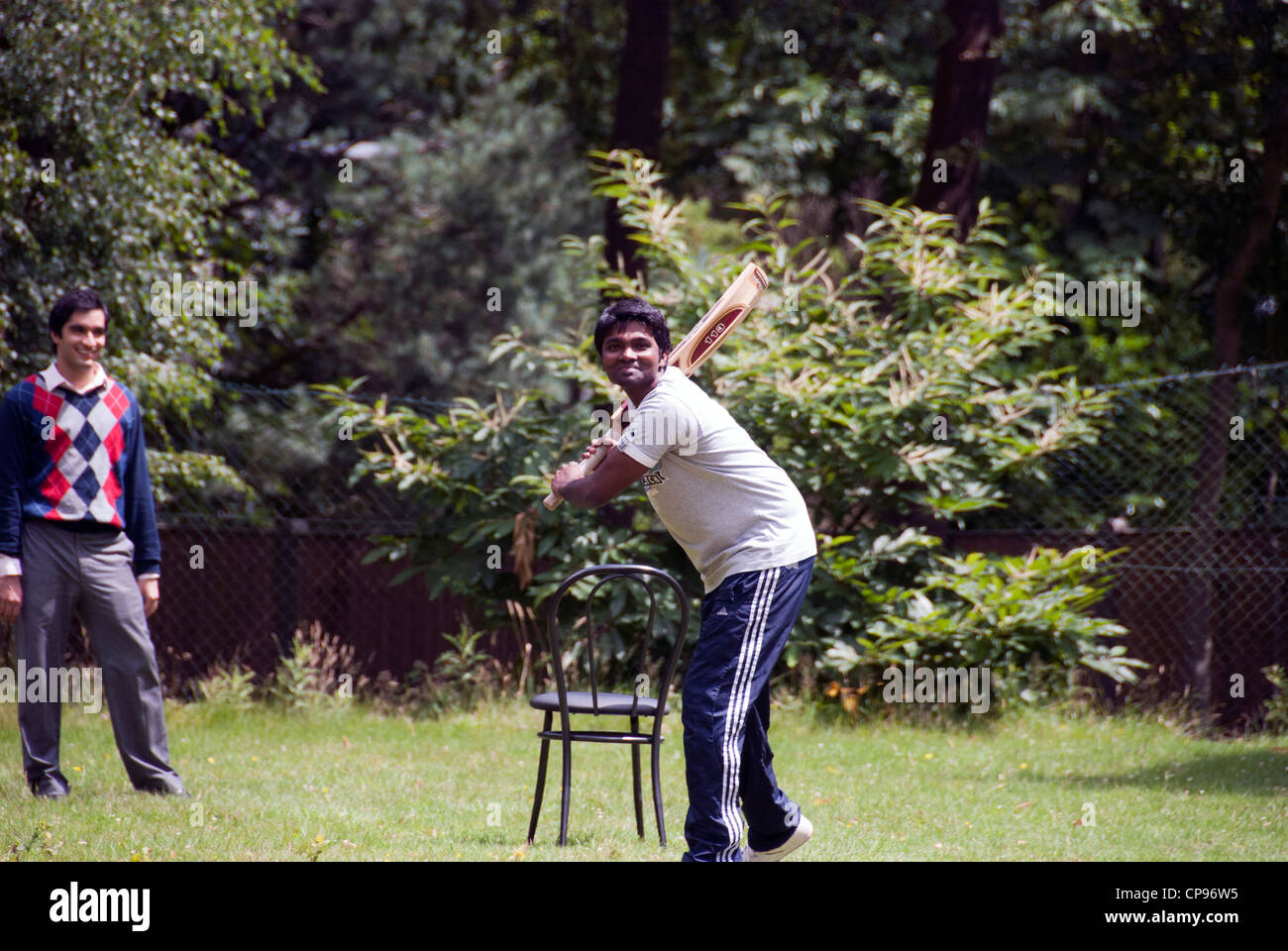 Indians playing cricket Stock Photo - Alamy