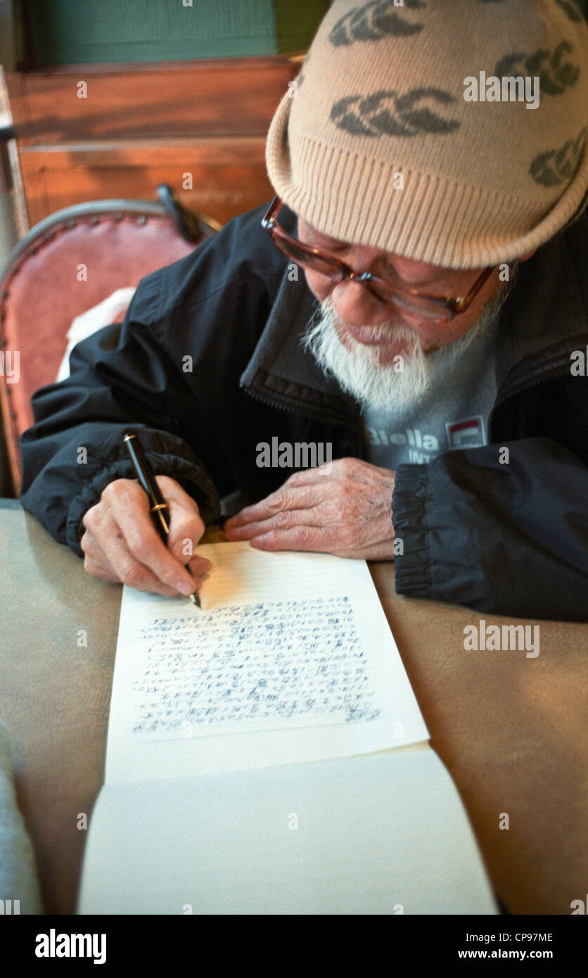 Old man writing a letter, Tokyo, Japan Stock Photo - Alamy
