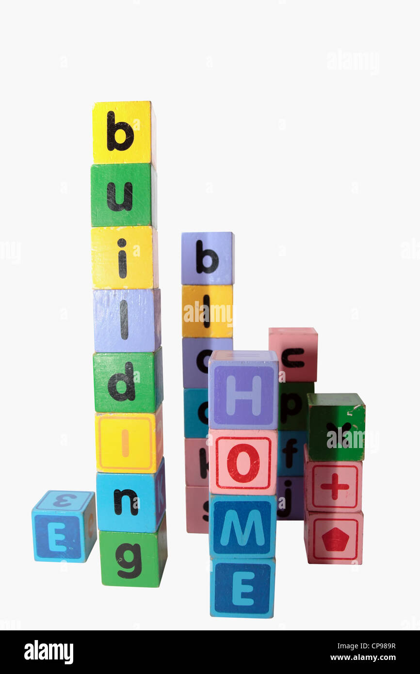 toy letters that spell home building blocks with white background and ...