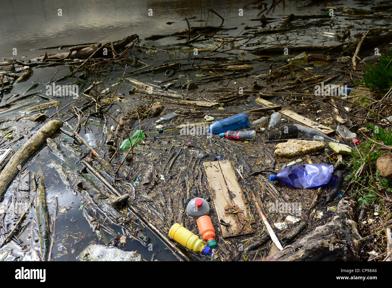 waste plastic products plastic on shore Stock Photo - Alamy
