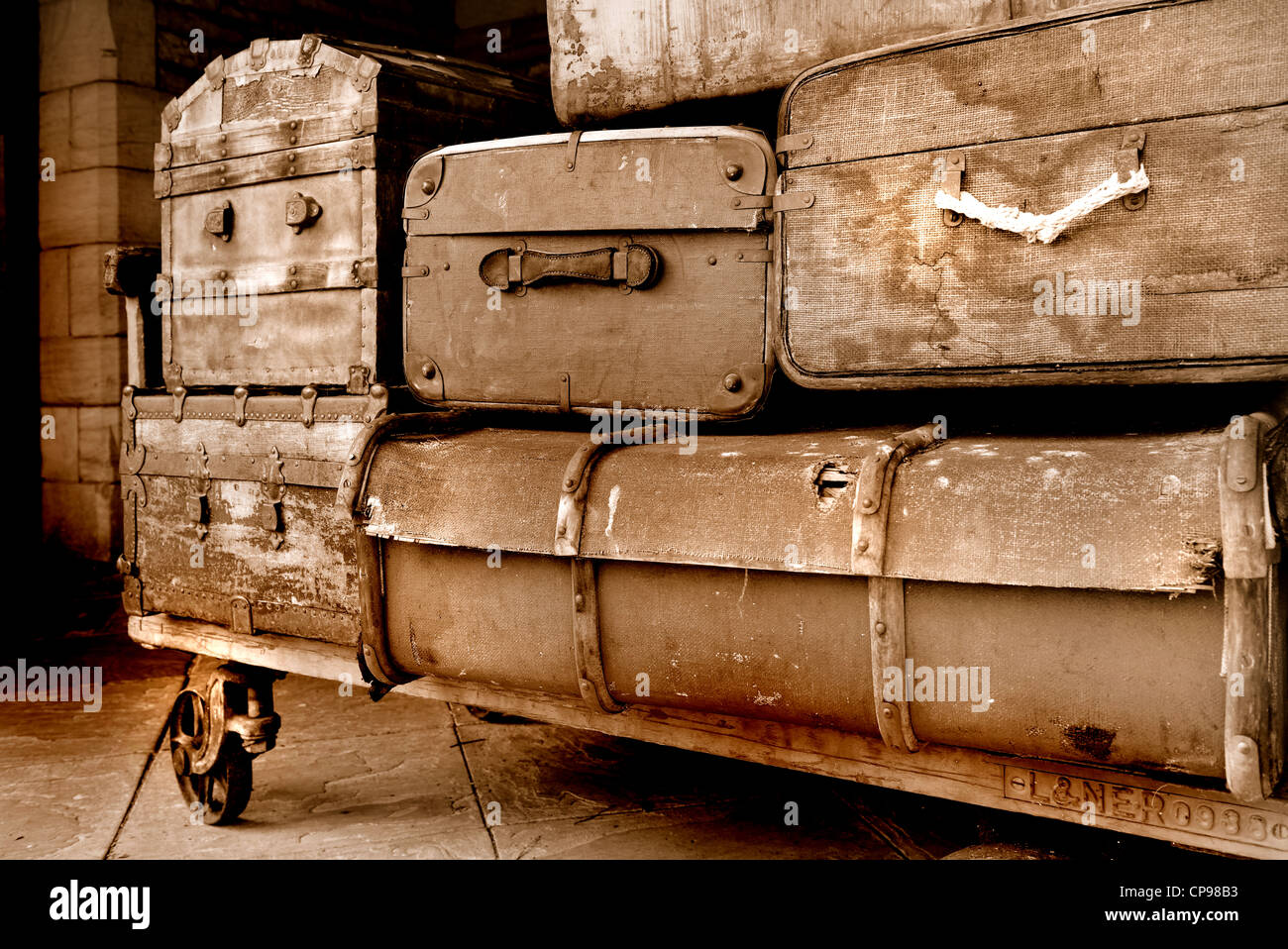 Victorian baggage cart sepia Stock Photo - Alamy