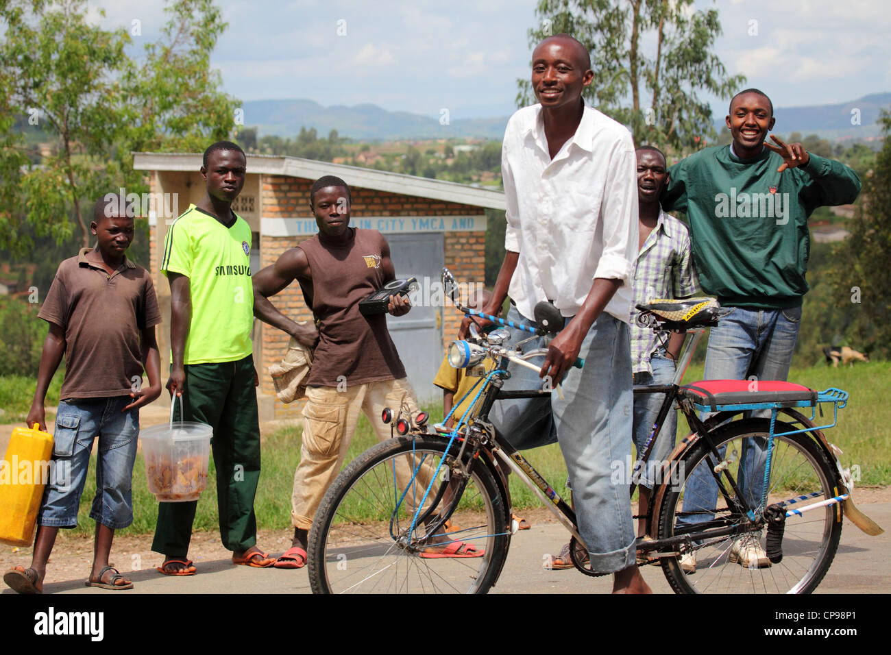 Young men on a rural street in the Southern Province of Rwanda Stock ...