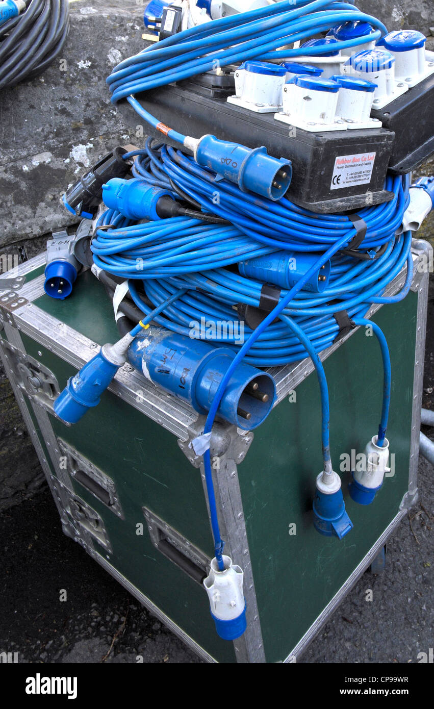 Electrical cables coiled on top of a storage box Stock Photo - Alamy
