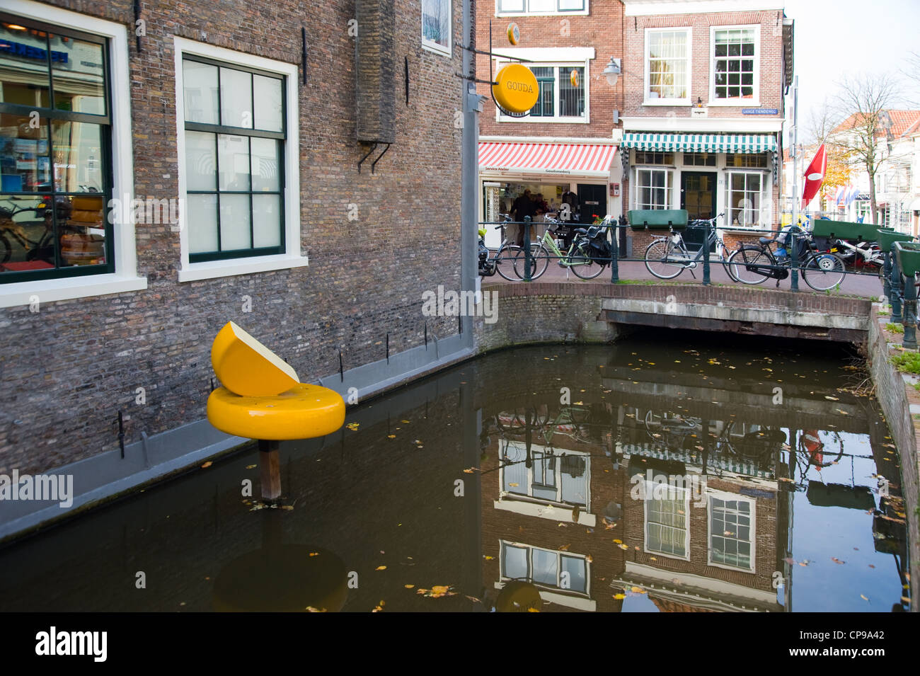 Gouda cheese display by the grocery store in Gouda Stock Photo - Alamy