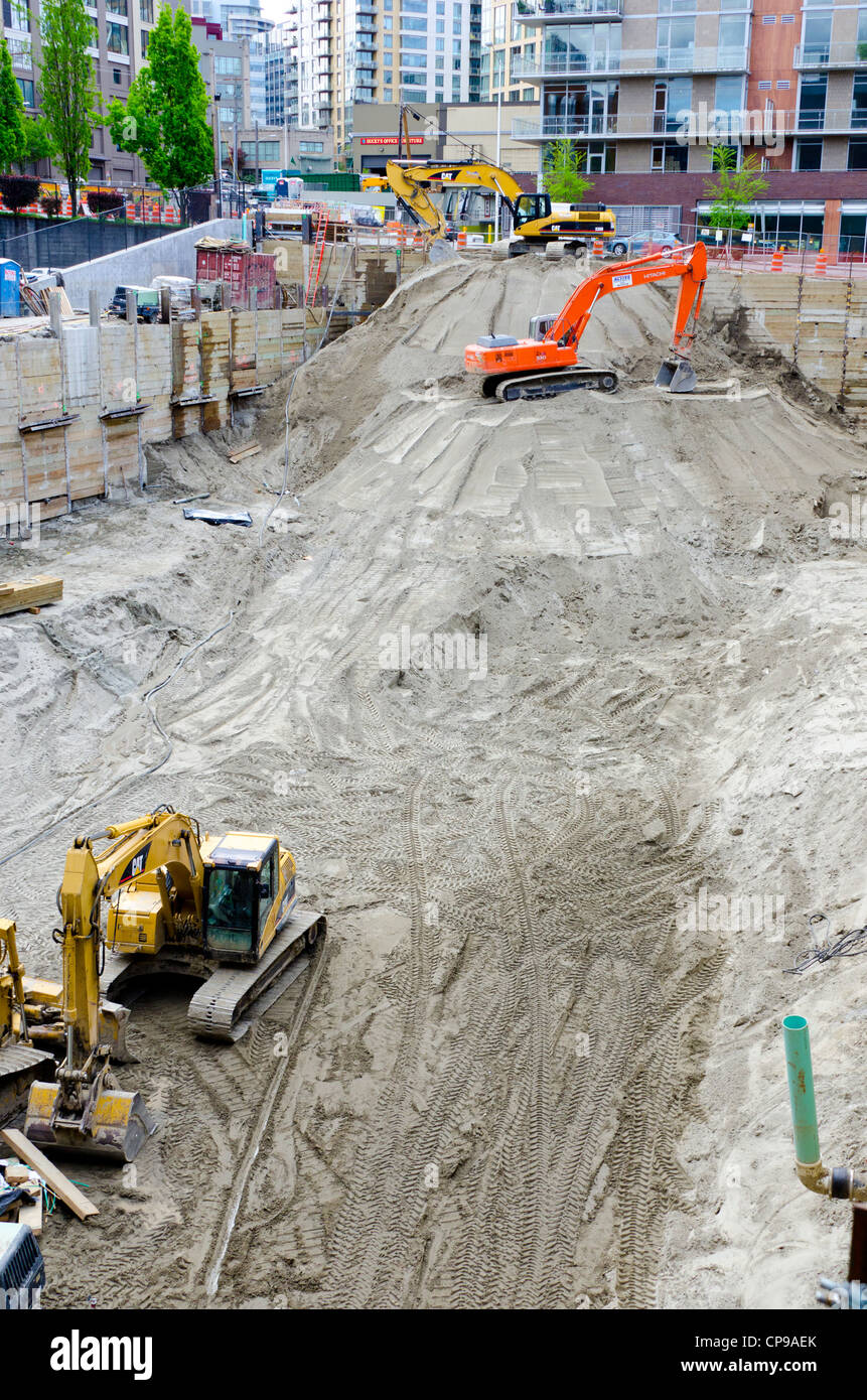 Huge construction hole being dugs for the foundation of a skyscraper in ...