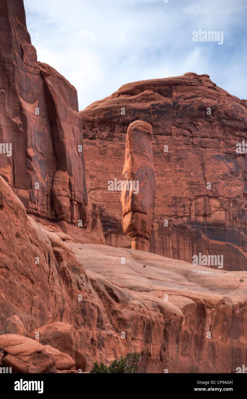 A pillar stands erect at the Park Avenue viewpoint in Arches National ...