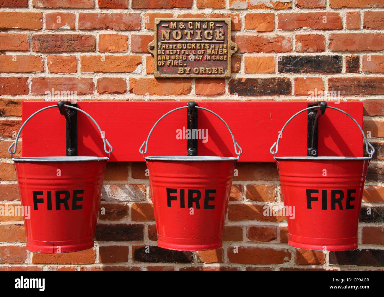 Hanging fire buckets hi-res stock photography and images - Alamy