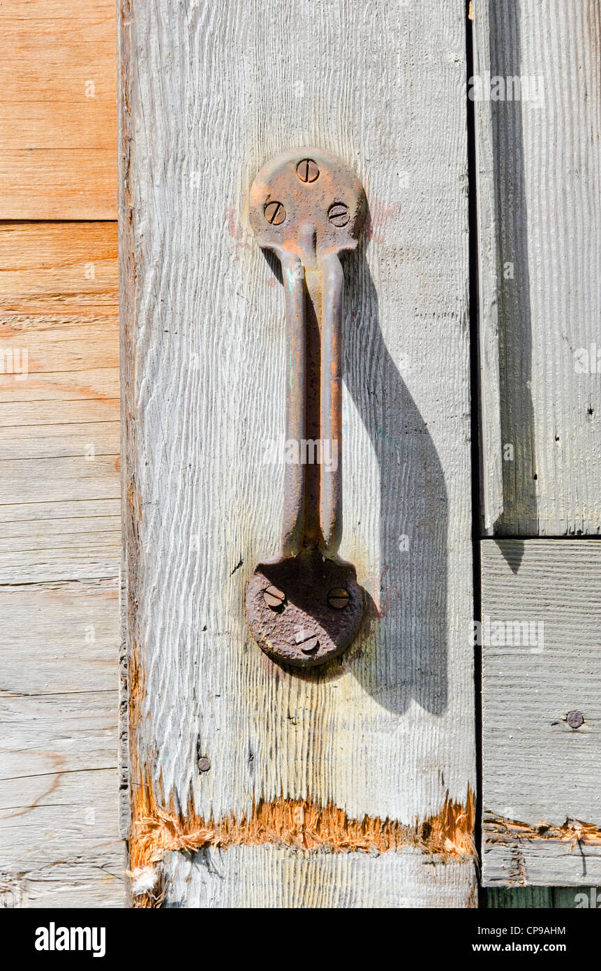 Rusty Door pull Stock Photo - Alamy