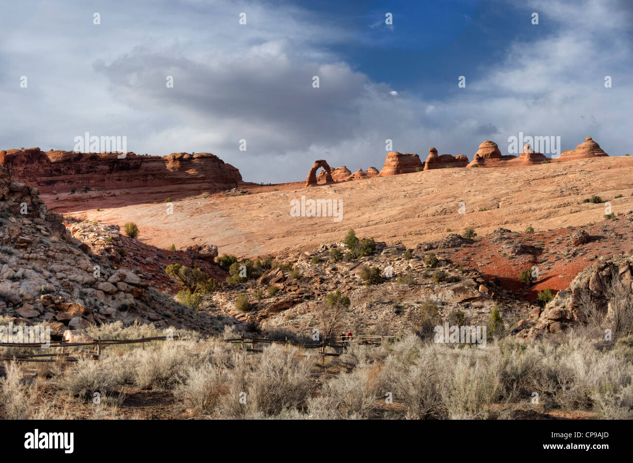 Hikers return from the Delicate Arch viewpoint in Arches National Park ...