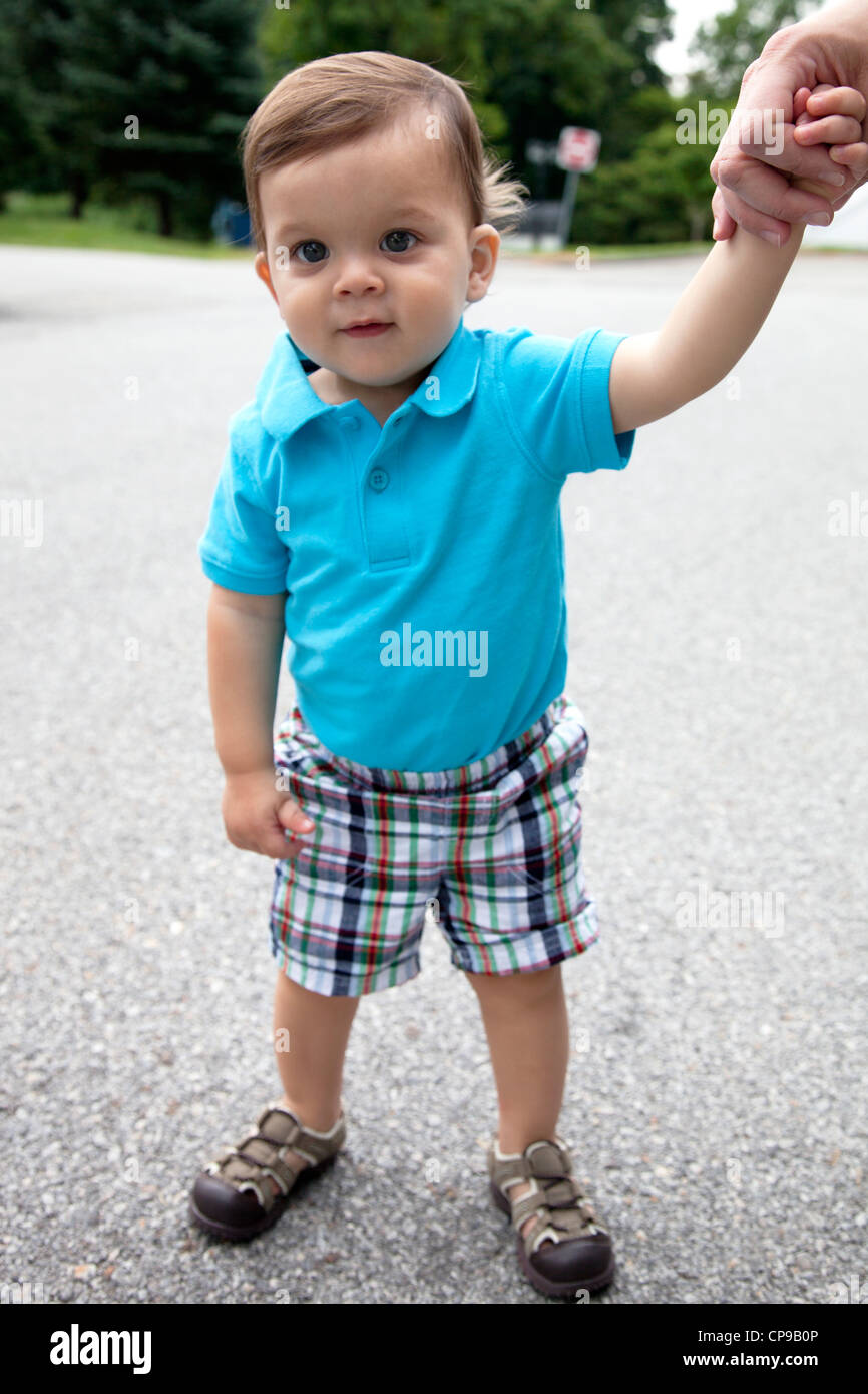 Young Boy Holding Hand Stock Photo - Alamy