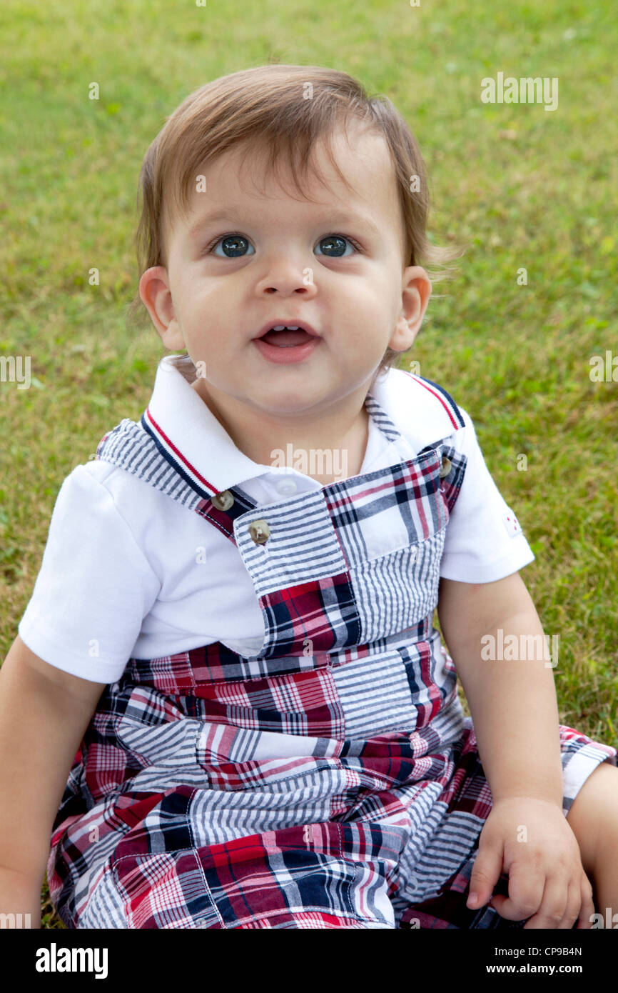 Smiling Young Boy Looking Up, Close-Up Stock Photo - Alamy