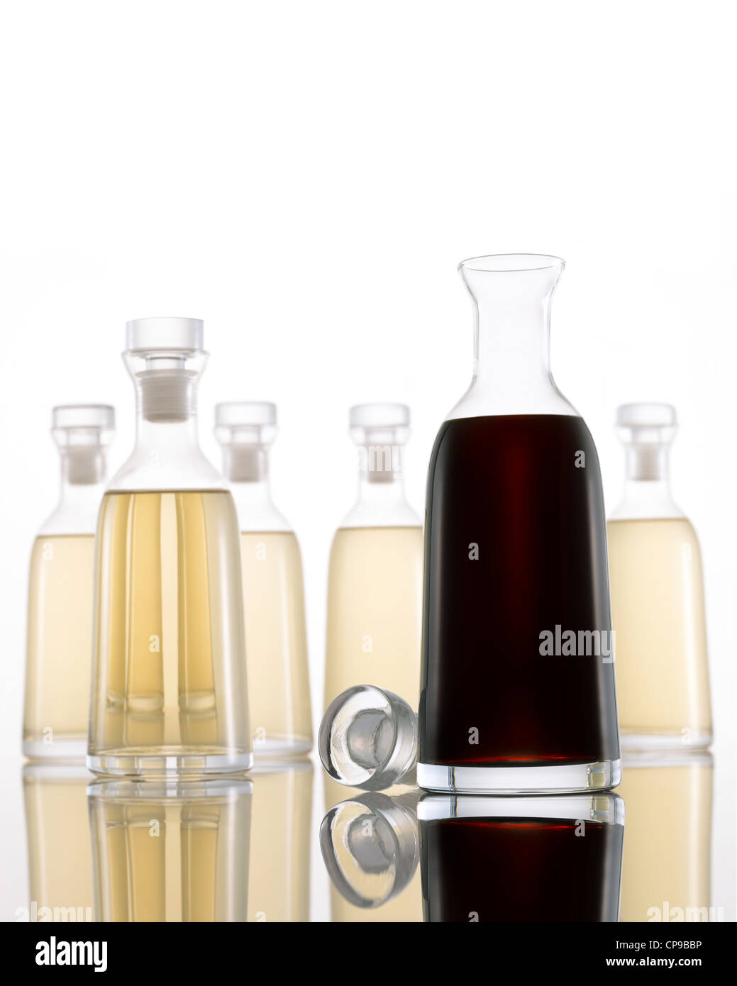 Bottled Light and Dark Vinegar on White Background Stock Photo - Alamy