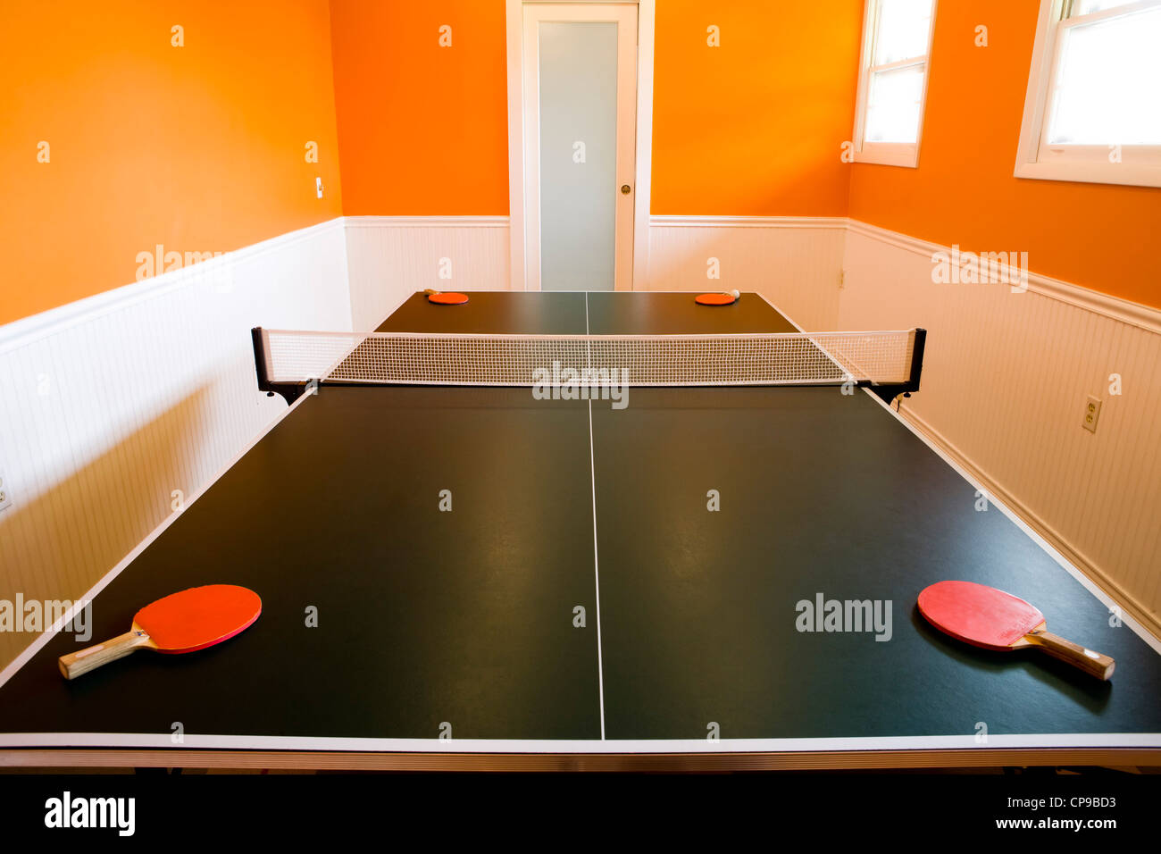 Ping Pong Table in Recreation Room Stock Photo - Alamy