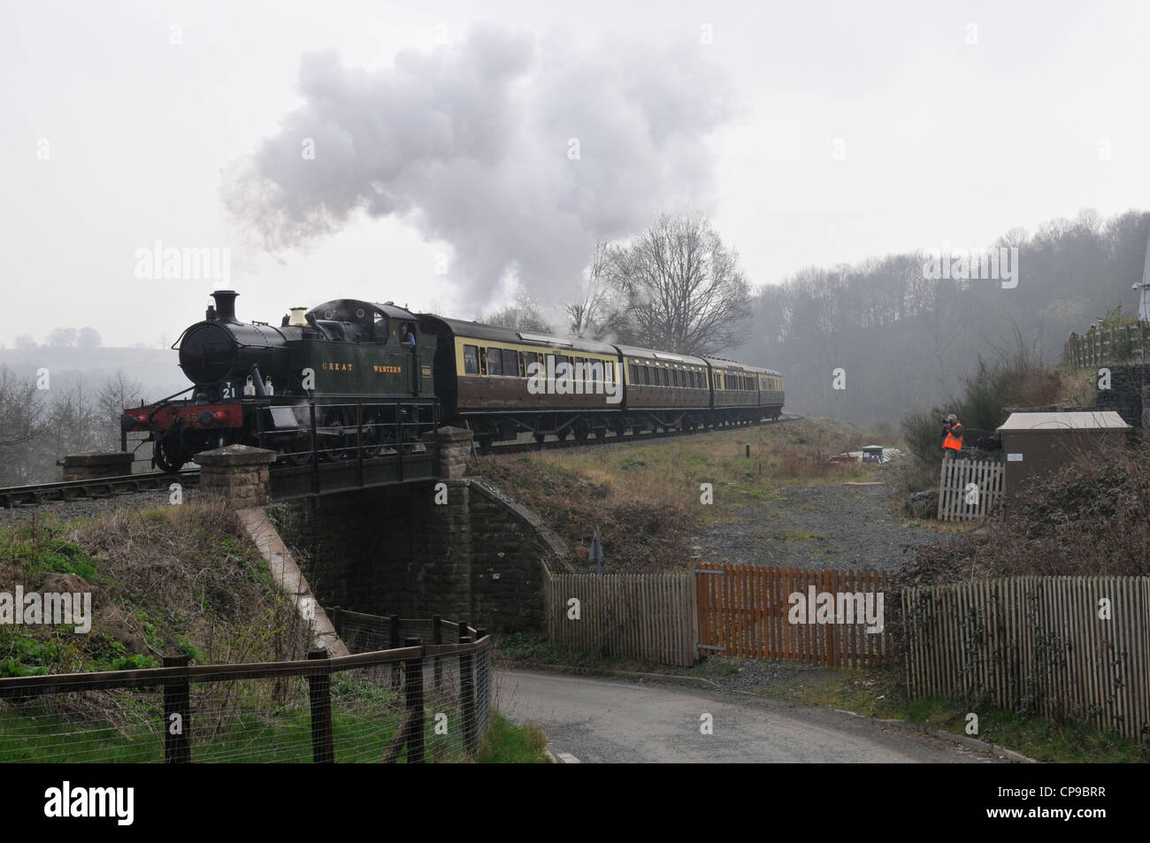 GWR prairie tank 4566 pulling the GWR coach set into Highley Station ...