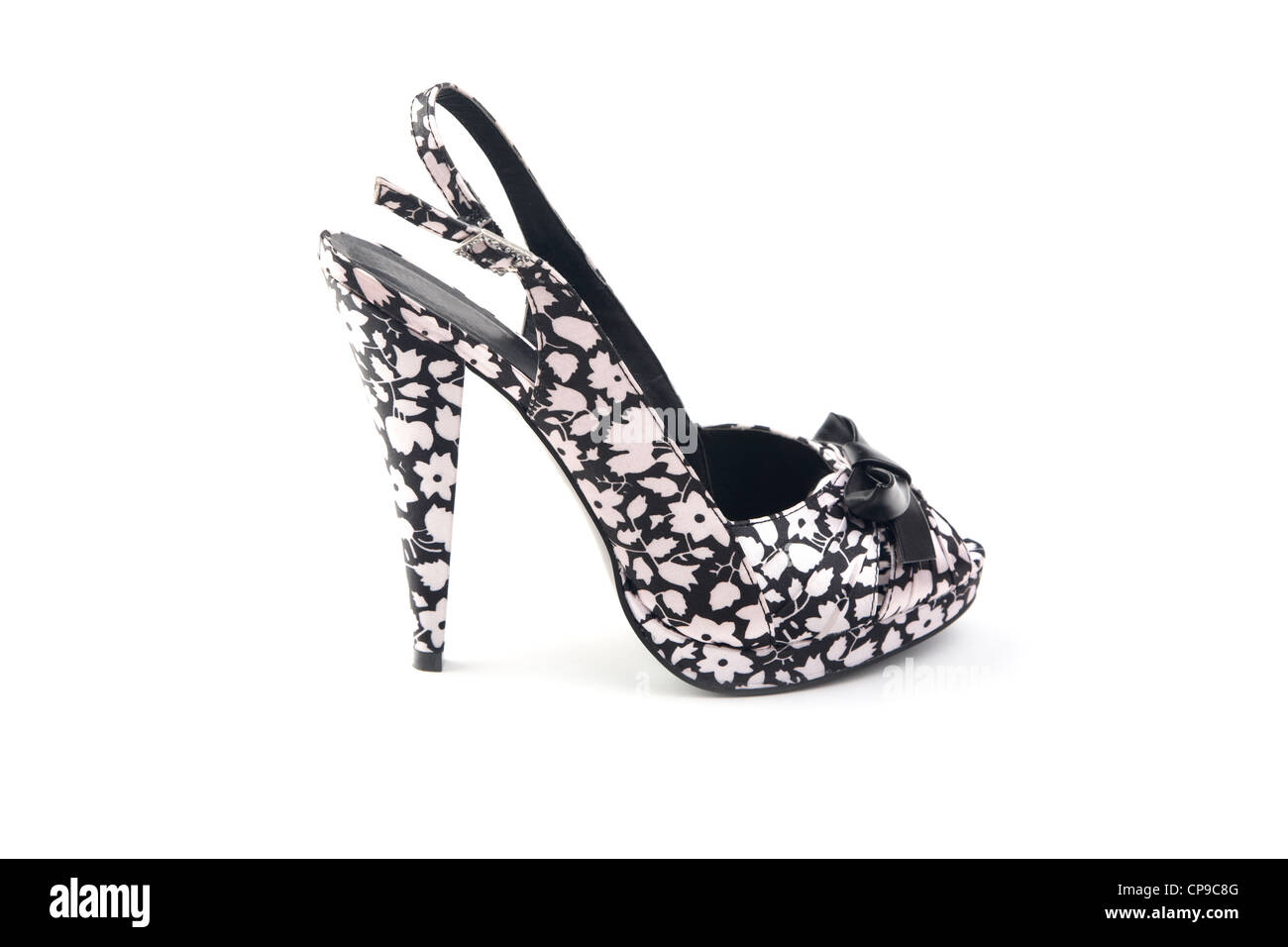 female shoe on a high heel white background Stock Photo - Alamy