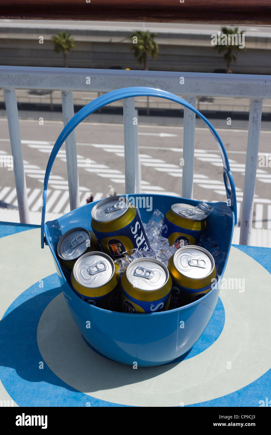Six cans of Fosters in an ice bucket Stock Photo - Alamy