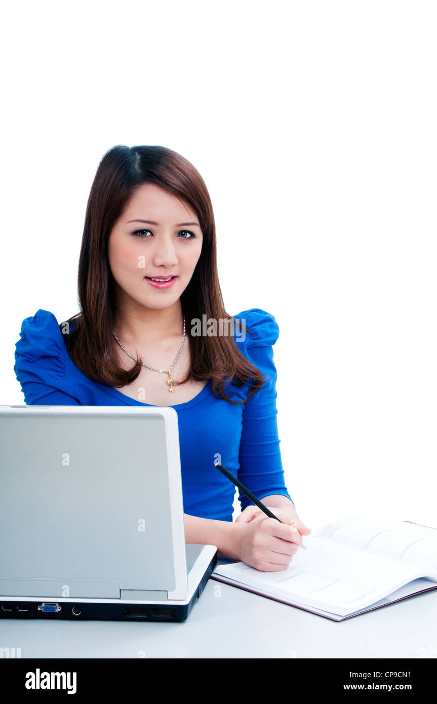 Cute young woman working Stock Photo - Alamy