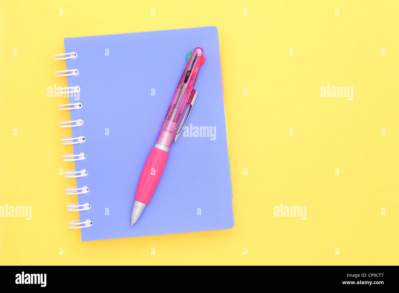 Notebook and ballpoint Stock Photo - Alamy