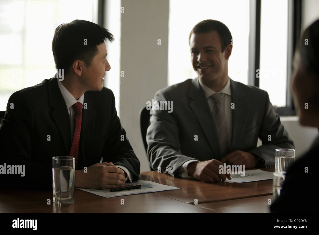 Business men talking during a meeting Stock Photo - Alamy