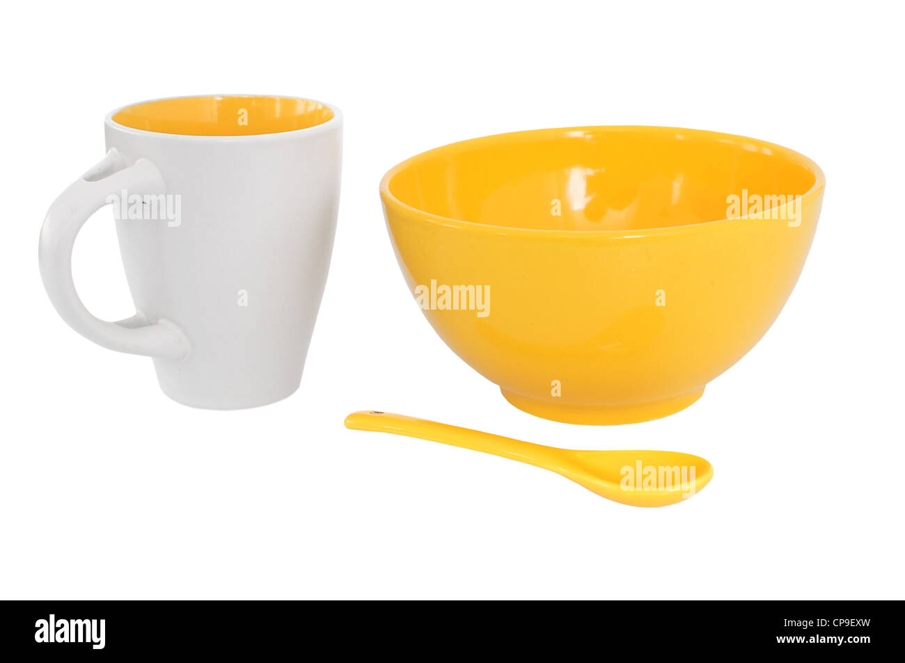 Breakfast set - mug, bowl, spoon in yellow, isolated on white Stock ...