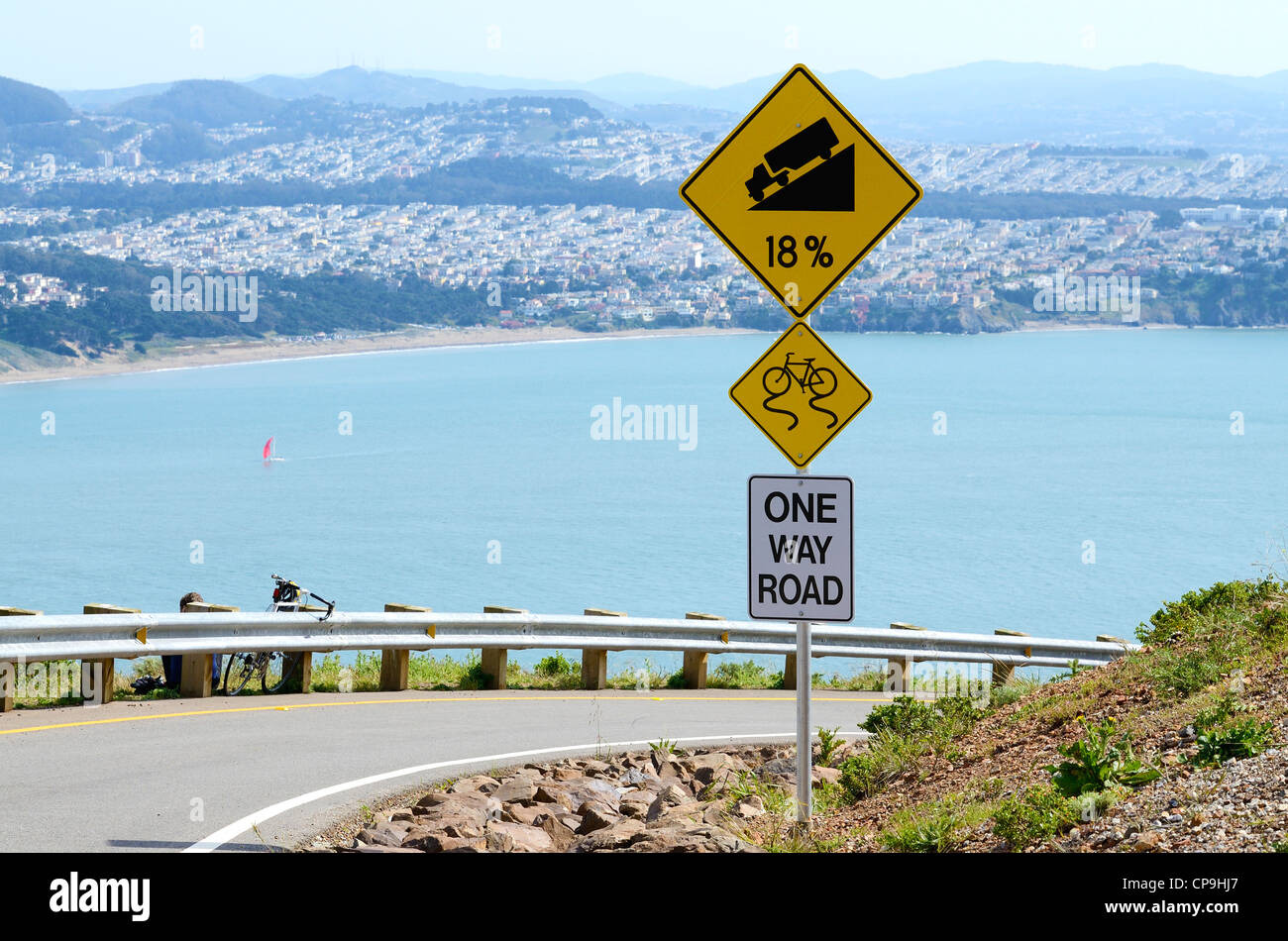 warning signs at the start of a one way road Stock Photo - Alamy