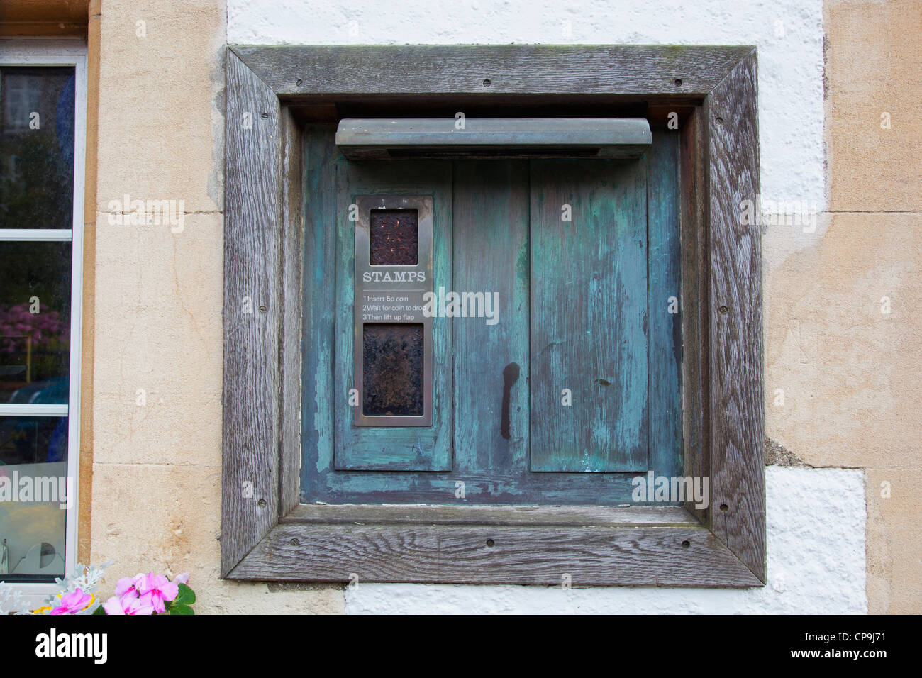 Lynton Post Office Stamp Dispenser Stock Photo - Alamy