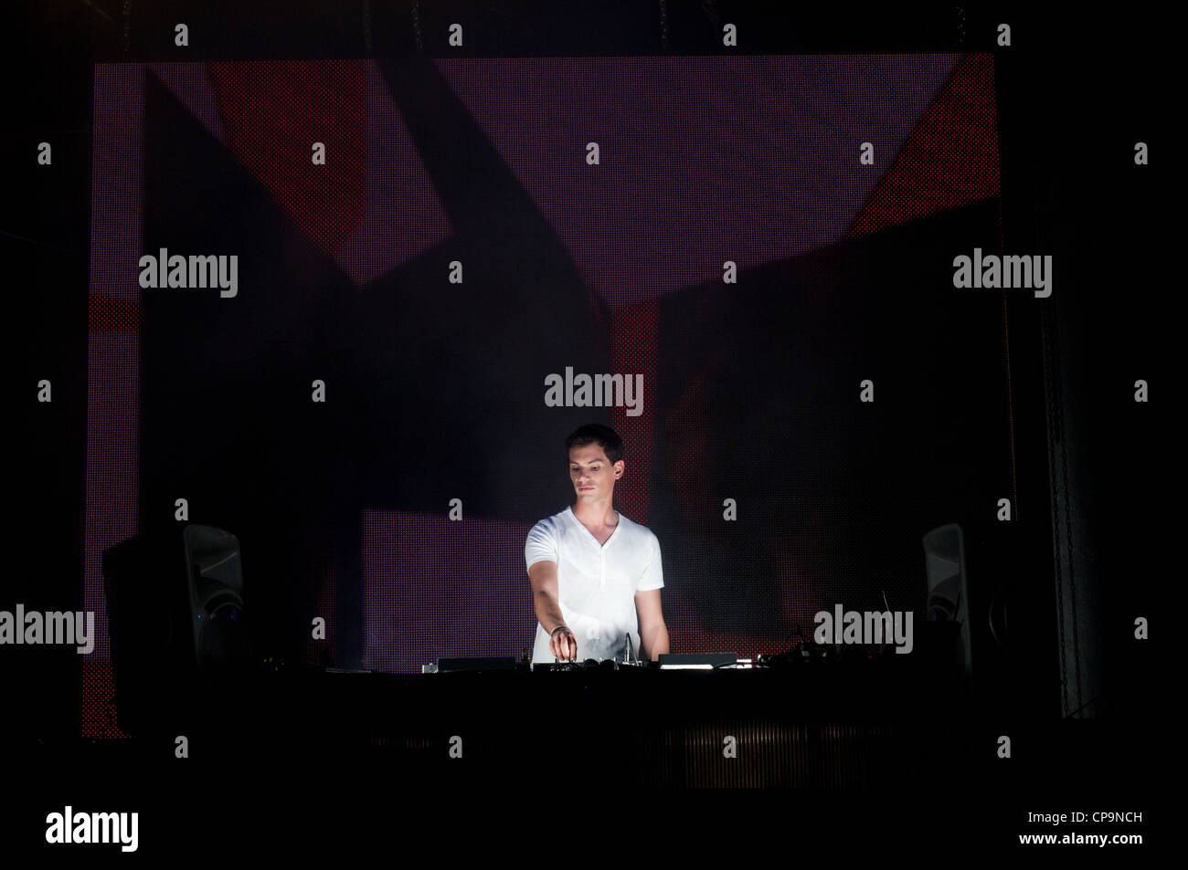 Dj in action, playing disco house music Stock Photo - Alamy