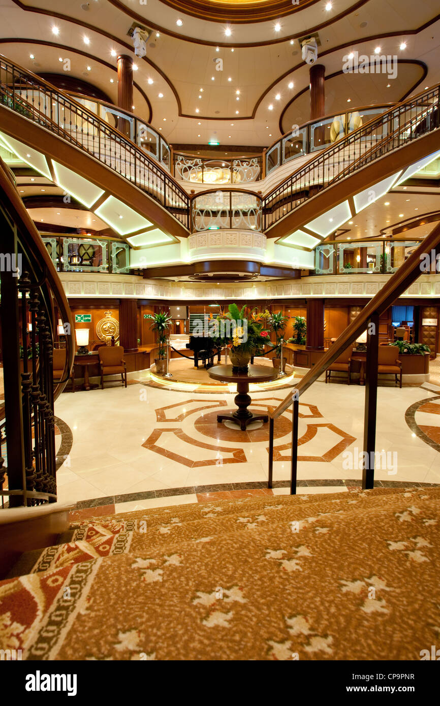 Luxury cruise ships have richly decorated interiors and public spaces ...