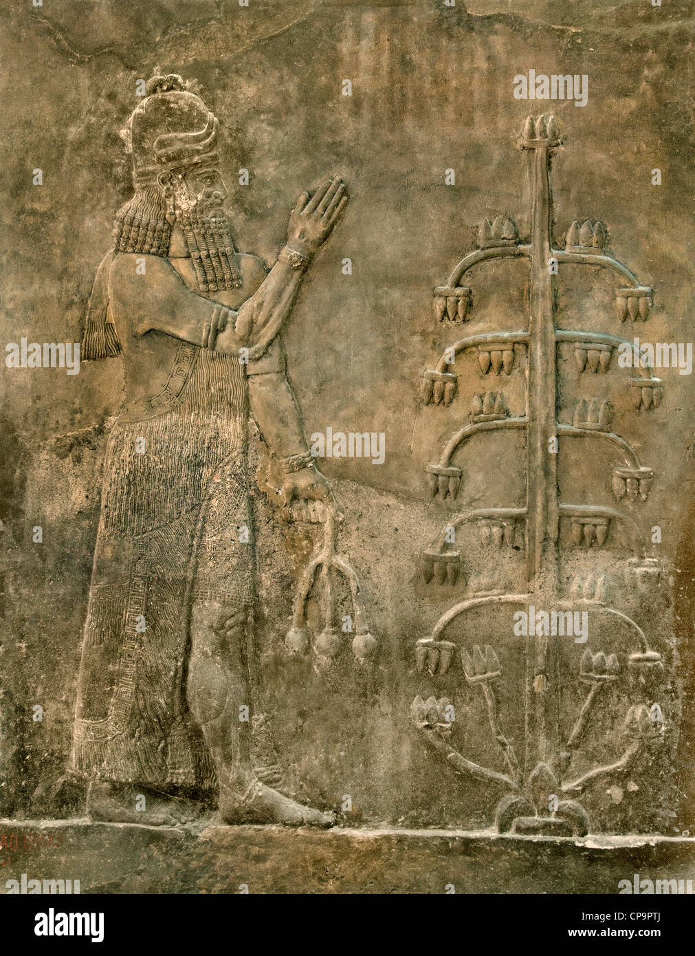 Figure holding a poppy flower Neo Assyrian palace of Sargon II 721-705 ...