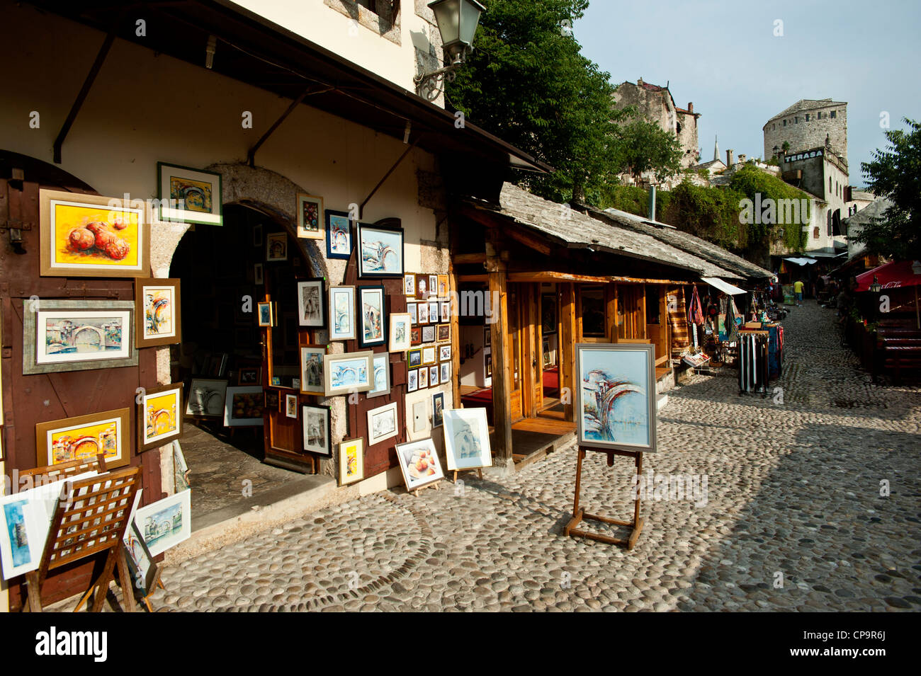 Souvenirs shops in a cobbled street known as Kujundziluk in Mostar old ...