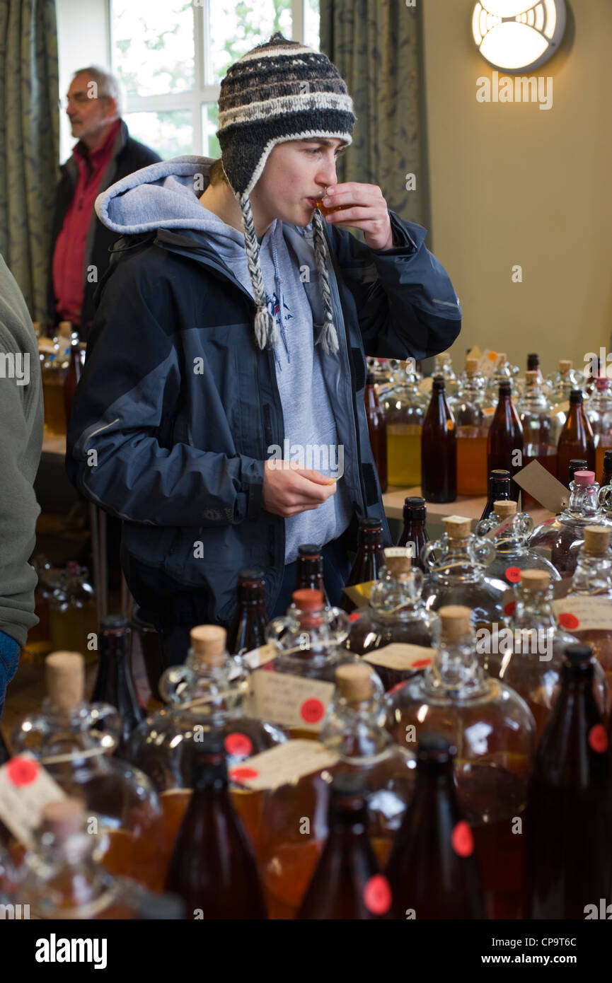 Visitors tasting farmhouse and homemade cider at THE BIG APPLE ...