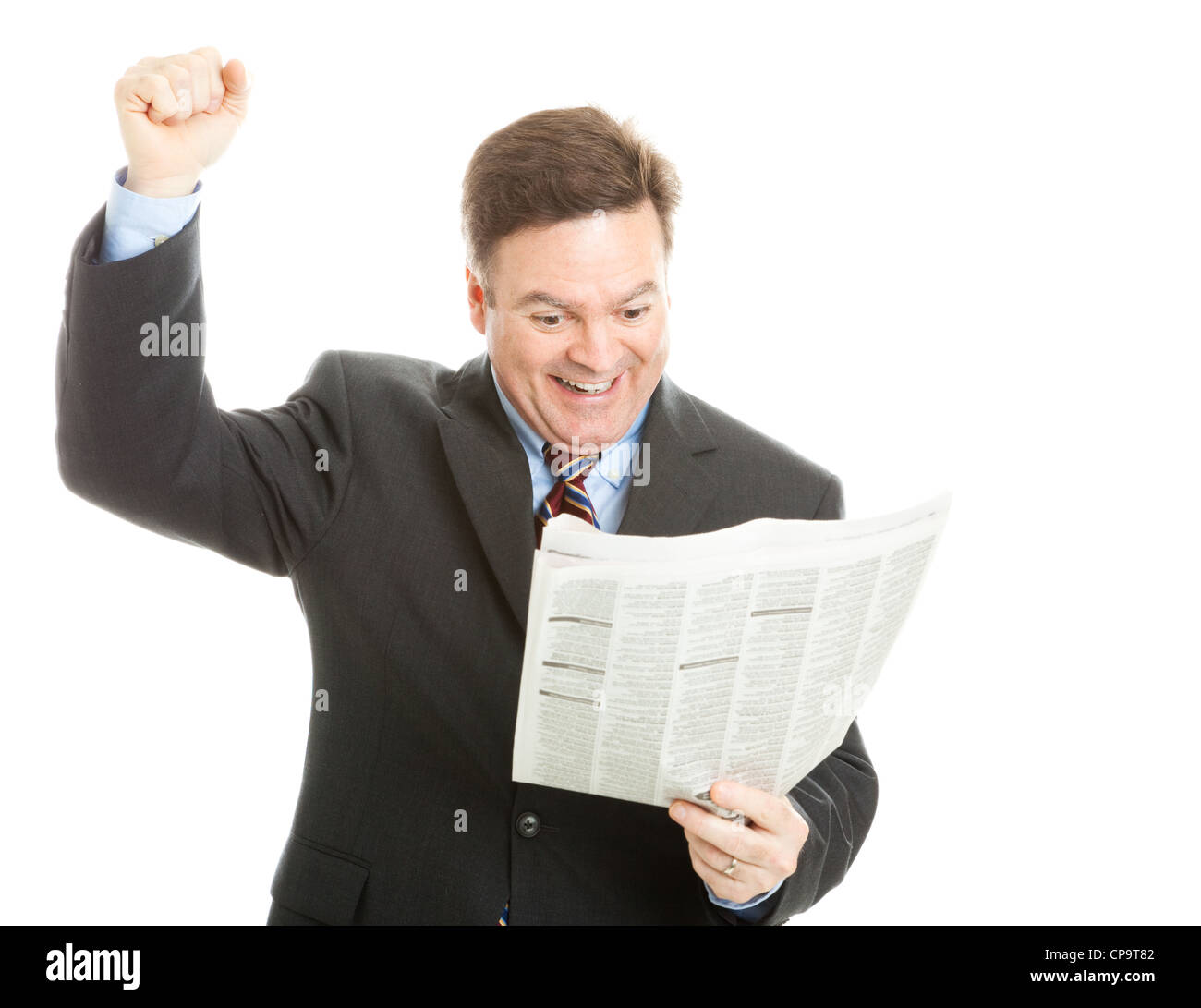 Excited businessman reading good news in the paper. Isolated on white ...
