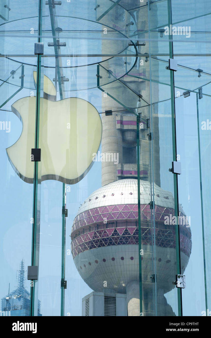 Detail of Apple logo in store with Pearl Oriental Tower to rear in ...