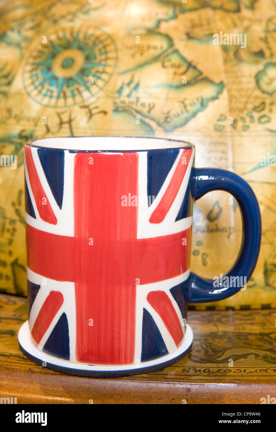 Union jack cup of tea on retro drinks globe Stock Photo - Alamy
