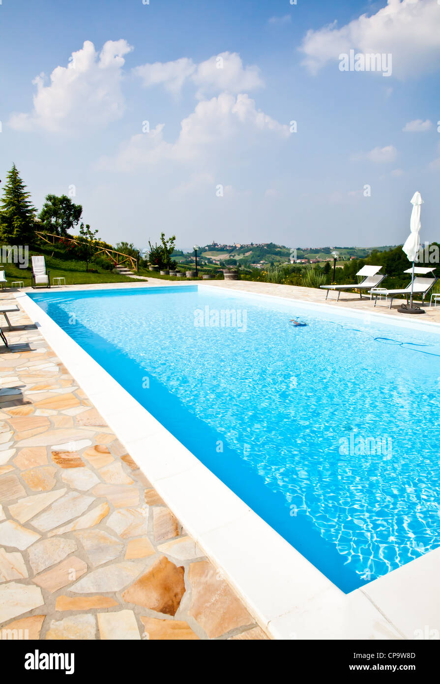 Swimming pool of an Italian beauty farm in the middle vineyards ...
