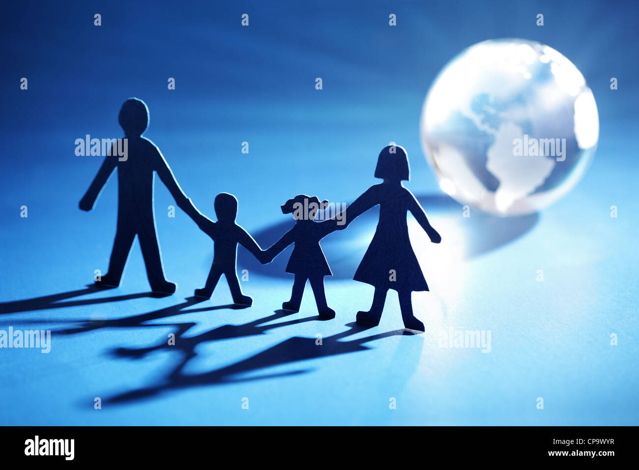 Paper chain family moving towards the light Stock Photo - Alamy Paper chain family moving towards the light Stock Photo - Alamy