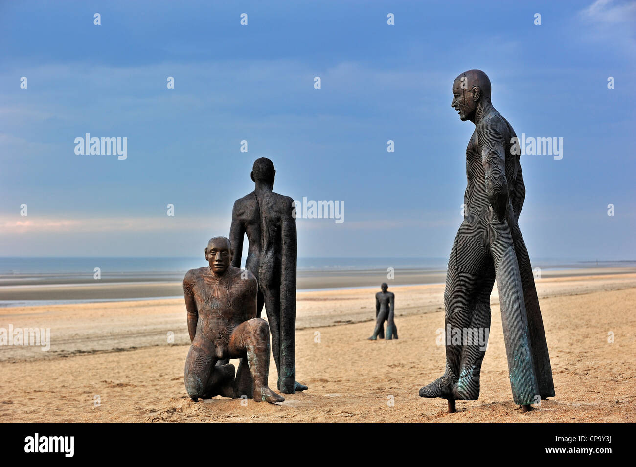 Players, sculptures by artist Michal Gabriel on the beach during ...