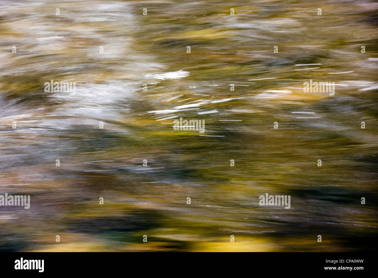 Blurred motion close up photograph of the Arkansas RIver running ...