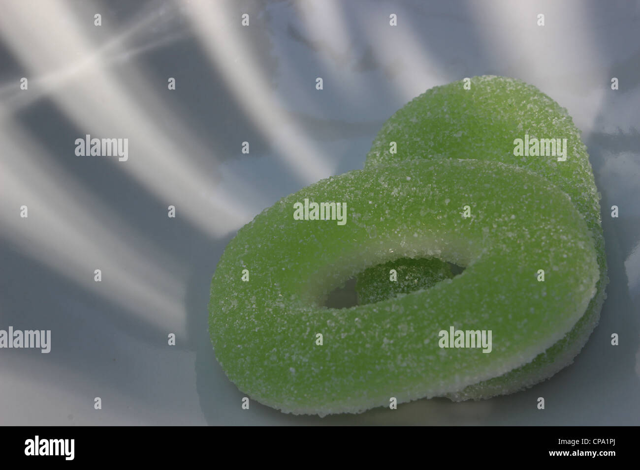fine image of sugar sweets on white background Stock Photo - Alamy