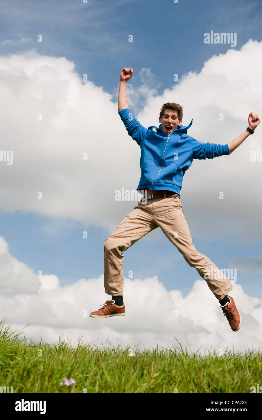 Happy jumping man outdoor in the fields Stock Photo - Alamy