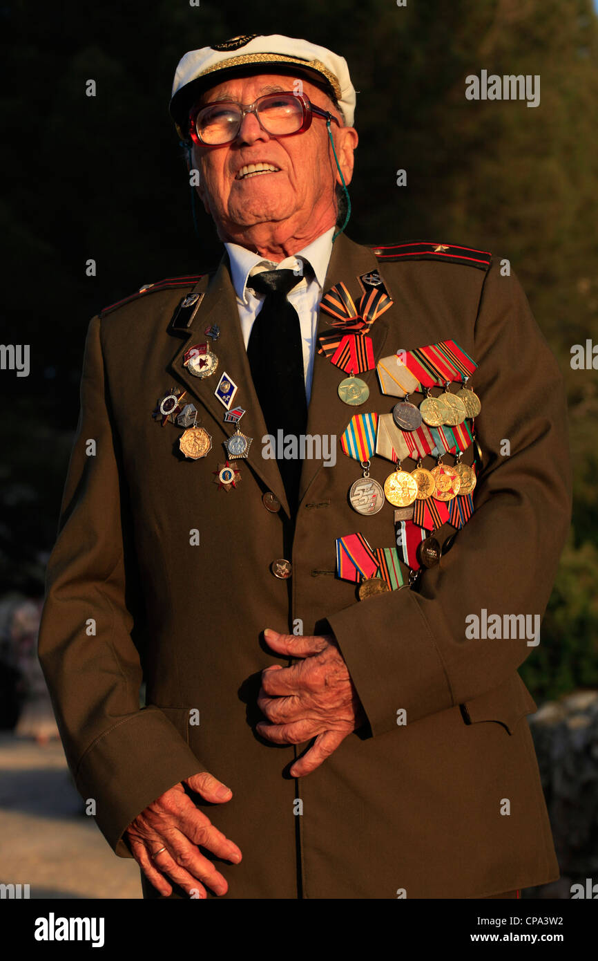 A soviet Jewish World War II veteran with medals pinned in his old ...
