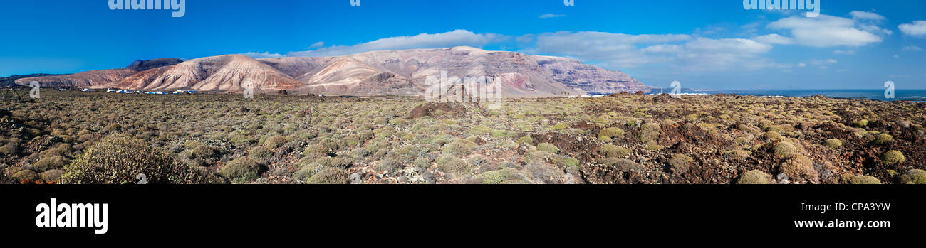 Panorama from the Malpais (badland) de la Corona towards the Famara ...