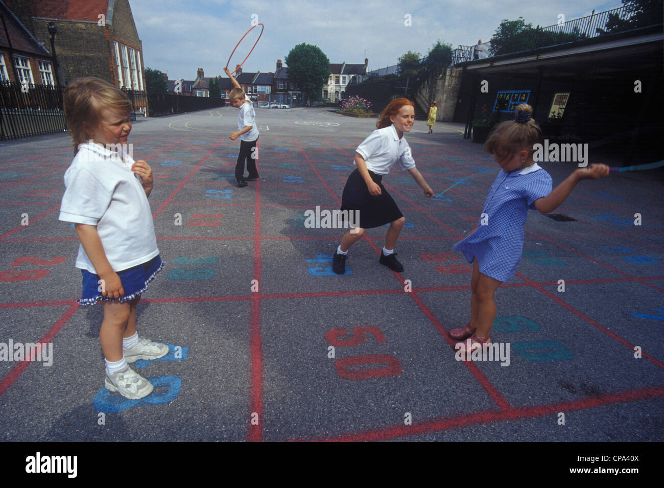 children in playground playing Stock Photo - Alamy