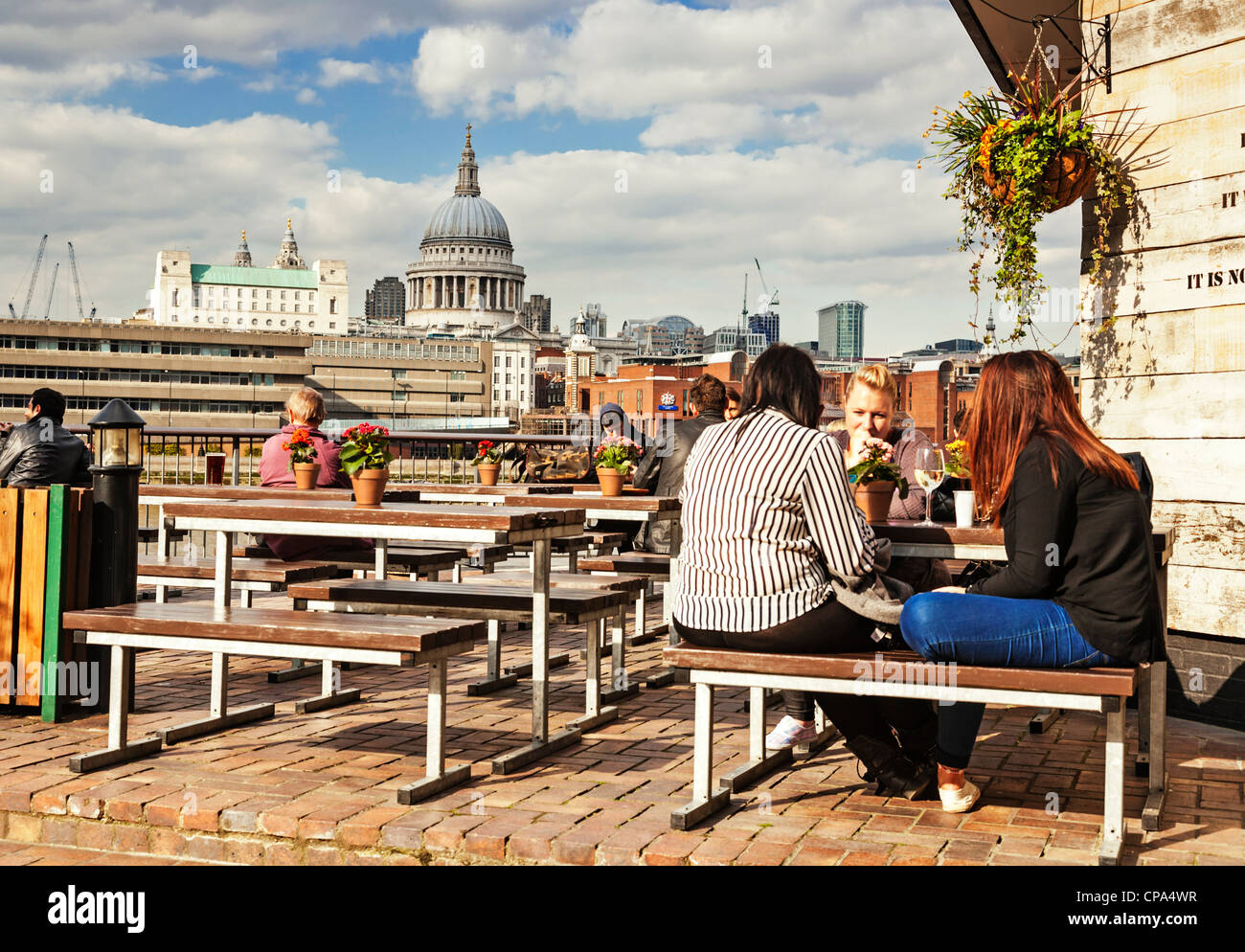 People enjoying a drink outside, South Bank, London, England Stock ...