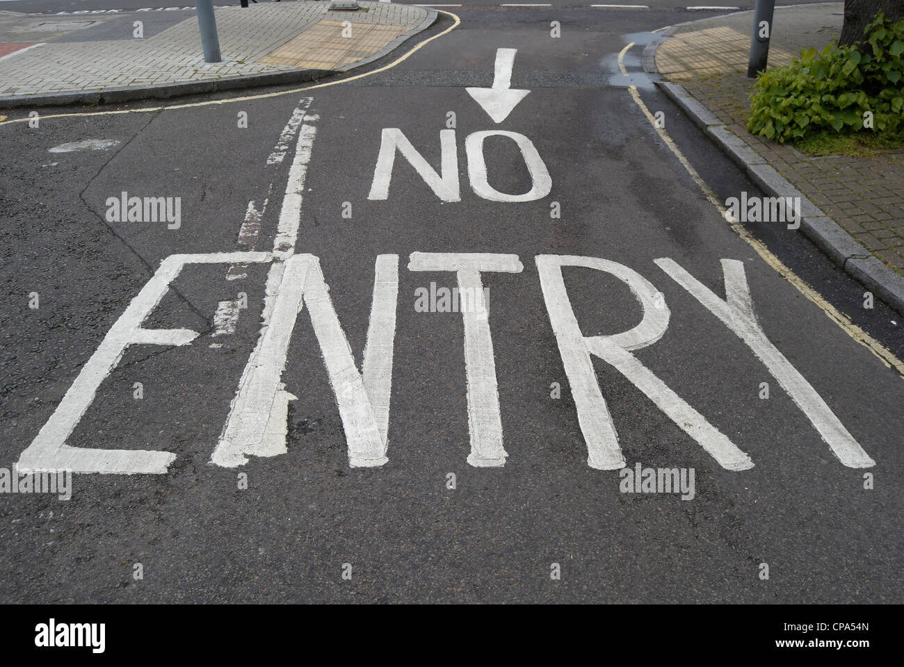 no entry road marking with arrow indicating travel from opposite ...