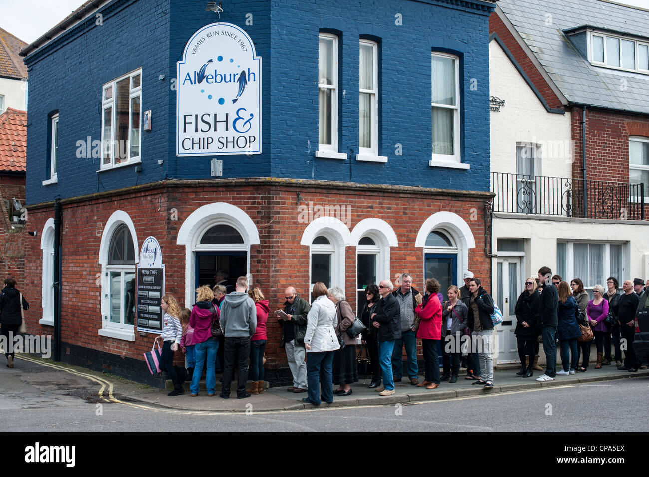 The famous fish and chip shop in Aldeburgh Suffolk UK withe queue out ...
