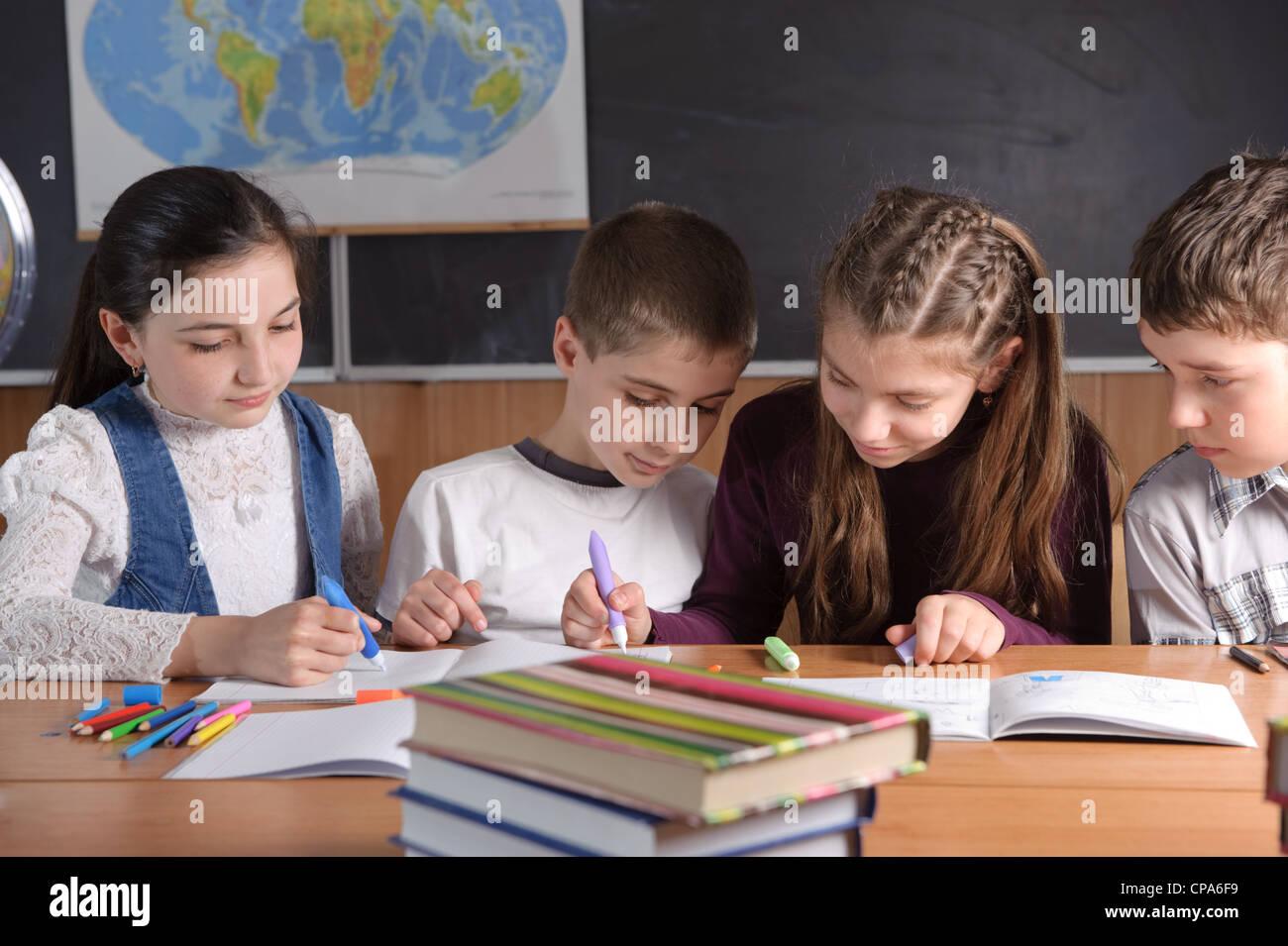 Group of pupils aged 11 study at classroom Stock Photo - Alamy